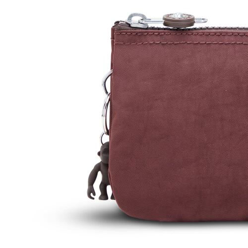 Cosmetiquera Kipling color vino modelo K13265V50
