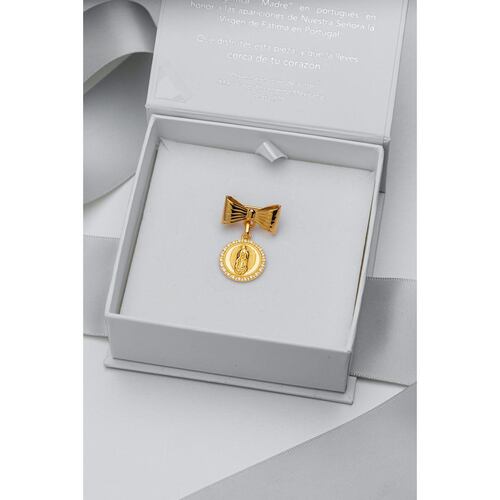 Segurito Virgen de Guadalupe marco de circonias en moño dorado